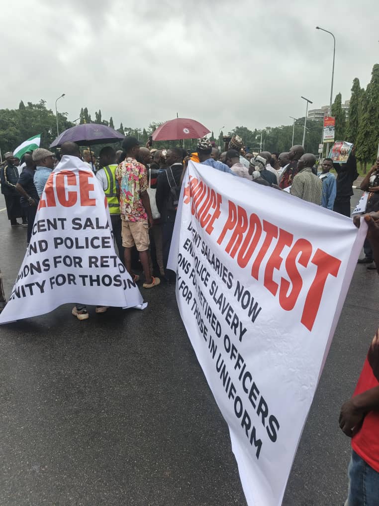 Retired Police Officers Protest in Rain at National Assembly Over ...